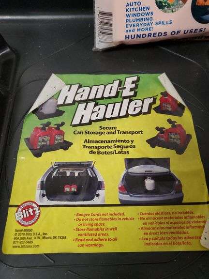 Two Hand-E Hauler transport holders (one new, one used). Holds gas can ...