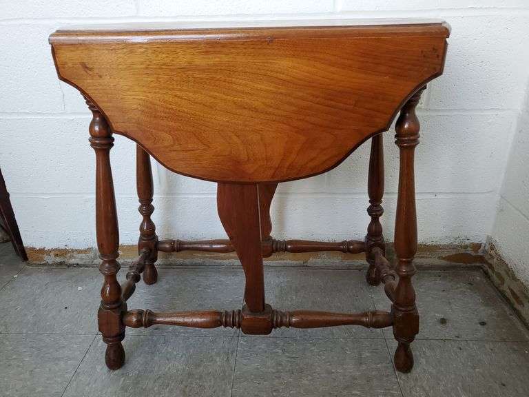 Solid wood drop leaf table. Measures 24w x 13d x 24h. - Bid-Assets Online Auctions
