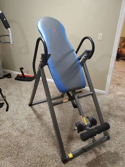 Iron Man inversion table.. located in basement - Bid-Assets Online Auctions