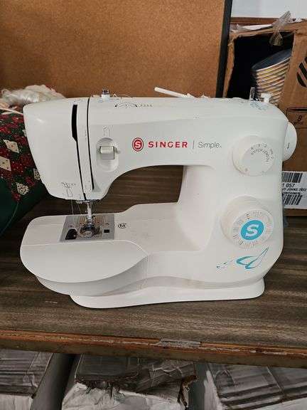Singer Simple Sewing Machine - Web Online Auctions