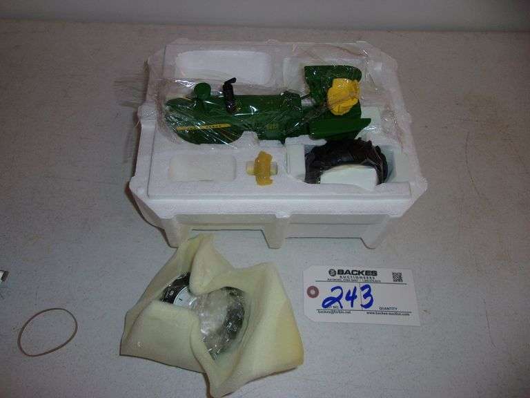 4010 John Deere tractor clock - Backes Commercial Auctioneers