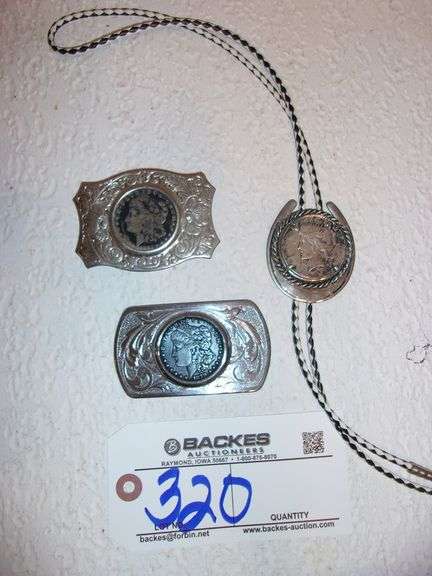 Belt Buckles and spring tie - Backes Commercial Auctioneers