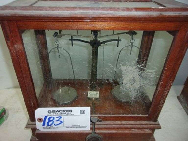 Medical scale, soiled and empty microscope case - Backes Commercial ...