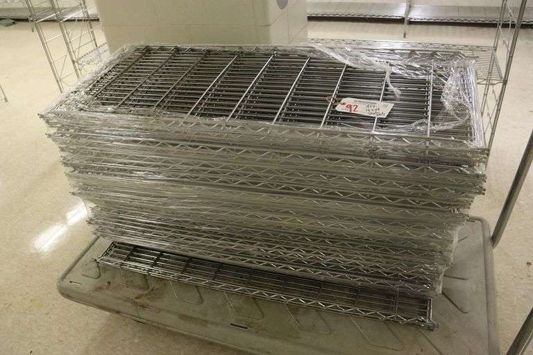 All to go - stack of 18" x 48" wire racks - Backes Commercial Auctioneers