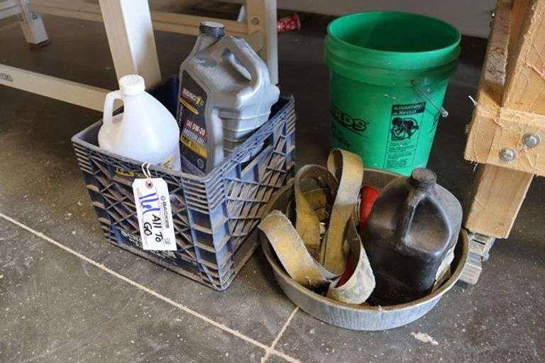 All to go - Oil pan, ratchet strap, & more under tables - Backes ...