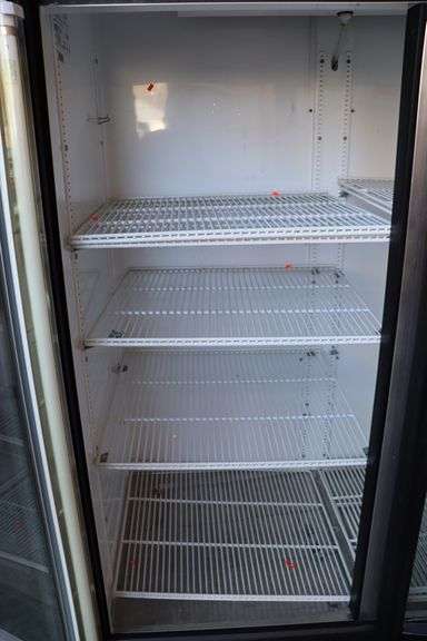 True GDM-49 glass 2 door cooler - Backes Commercial Auctioneers