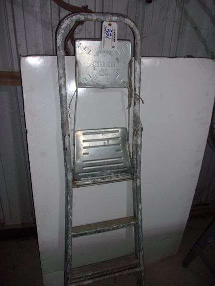 Metal step ladder - Backes Commercial Auctioneers