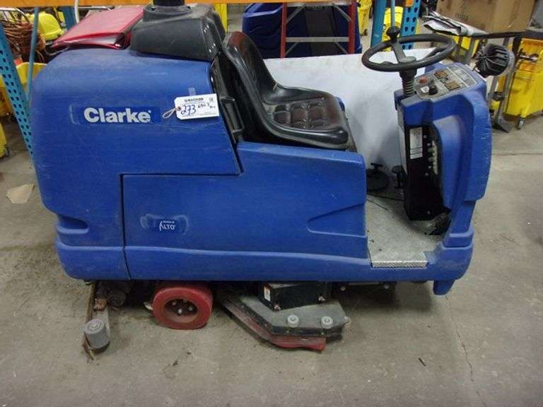 Clark Boost Ride on scrubber, new batteries - Backes Commercial Auctioneers
