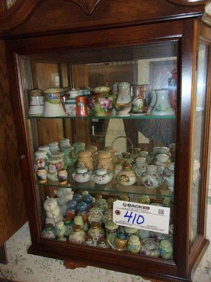 Large salt and pepper collection in wall cabinet 22" x 28", included ...