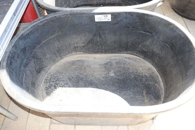 Times 2 - 100 gallon poly tubs - Backes Commercial Auctioneers