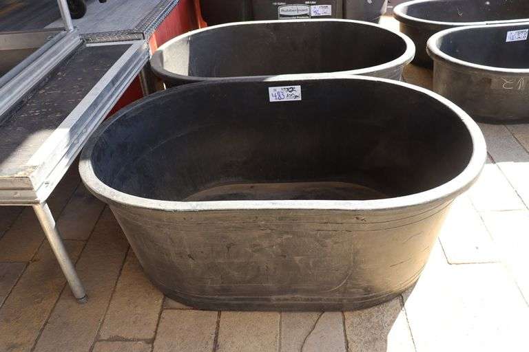 Times 2 - 100 gallon poly tubs - Backes Commercial Auctioneers