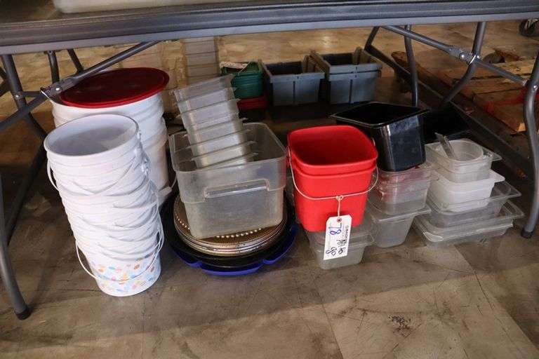 All to go - Assorted buckets, pans, & more under the table - Backes ...