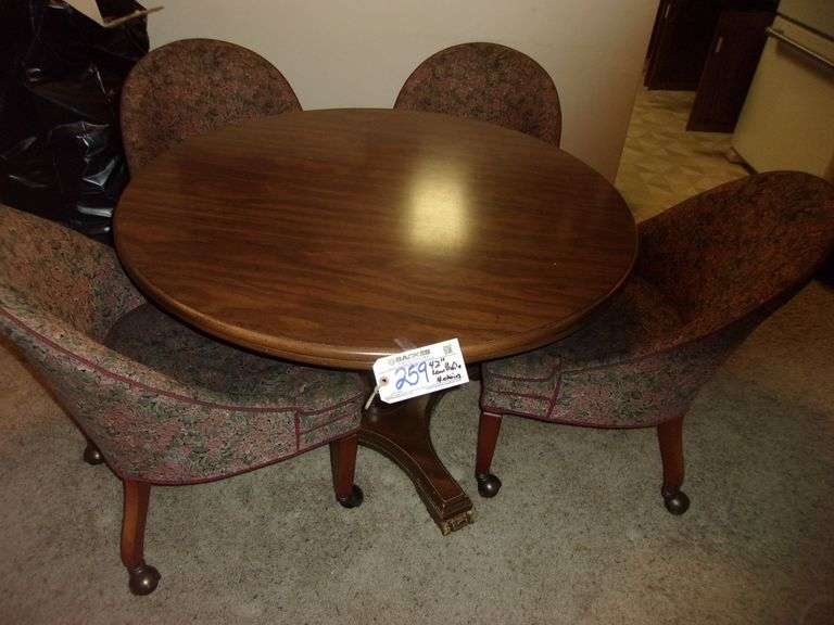 42" round low profile table with 4 chairs - Backes Commercial Auctioneers