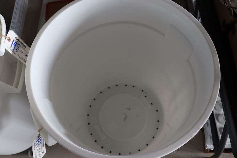 55 gallon perforated barrel with dolly - Backes Commercial Auctioneers