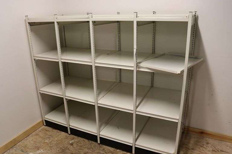 2' x 4' x 5' white metal rack - located upstairs - buyer to remove ...