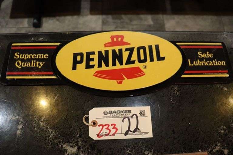 22" long Pennzoil wall sign - Backes Commercial Auctioneers
