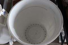 55 gallon perforated barrel with dolly - Backes Commercial Auctioneers