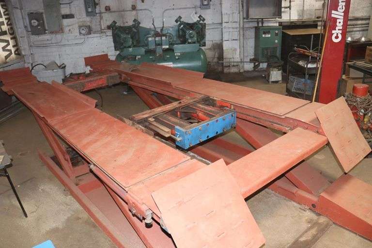 Hunter Model RL drive on automotive alignment scissor lift with 2 ...