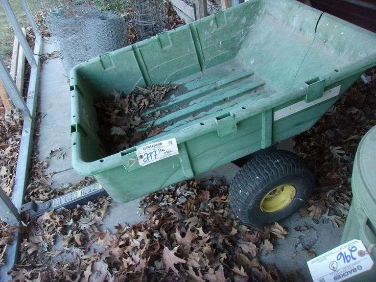 Poly yard cart, large crack in rear - Backes Commercial Auctioneers