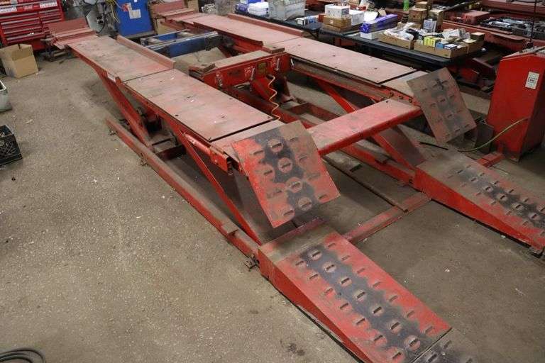 Hunter Model RL drive on automotive alignment scissor lift with 2 ...