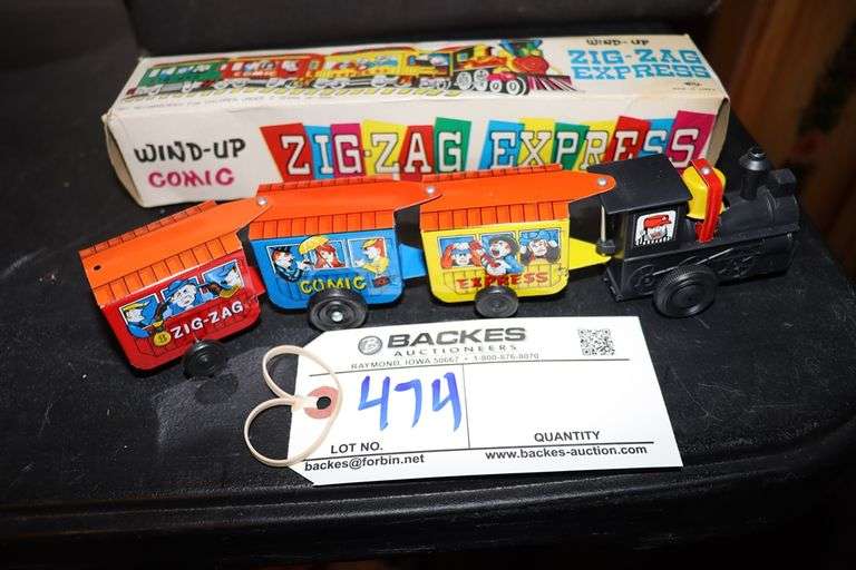 MTU Wind Up Comic tin Zig Zag express toy - Backes Commercial Auctioneers