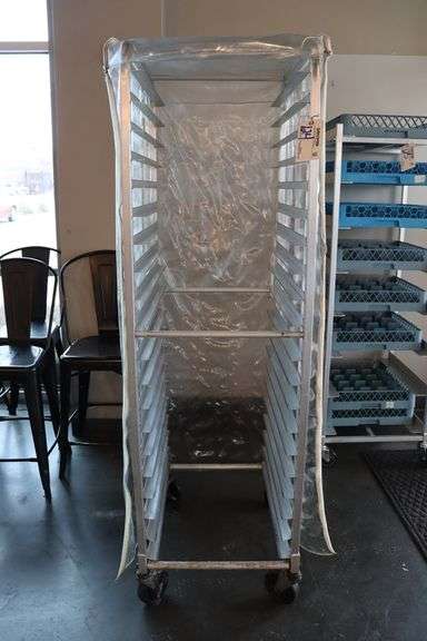 Portable aluminum sheet pan rack with cover - Backes Commercial Auctioneers