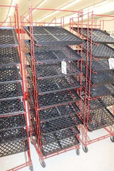 21" x 24" red metal fold up bread racks - Backes Commercial Auctioneers
