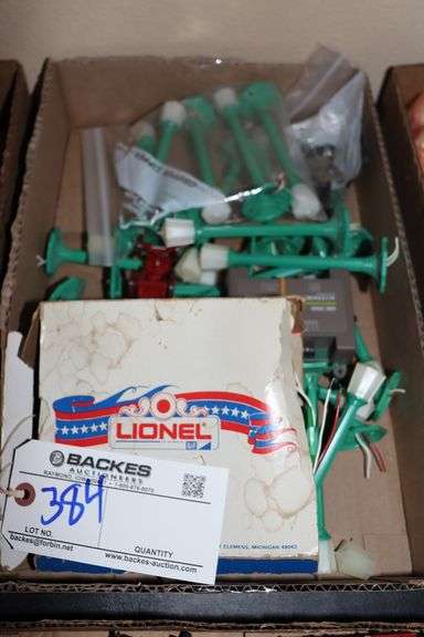 Box to go - Green plastic light poles - Backes Commercial Auctioneers