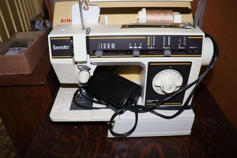 Singer Sonata sewing machine with cover - model 6606 - located upstairs ...