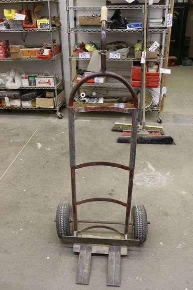 Red 2 wheel pneumatic tire cart - Backes Commercial Auctioneers