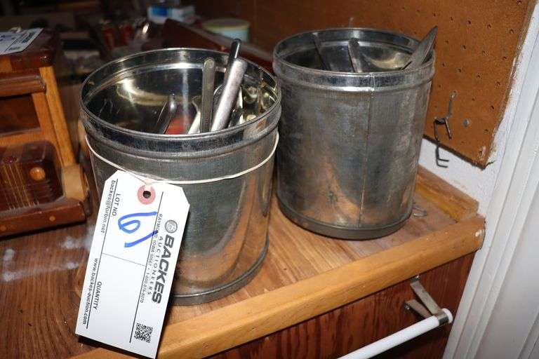 Pair to go - Metal buckets with assorted silverware - located upstairs ...
