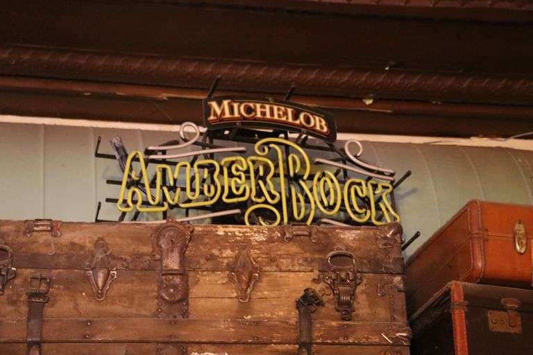 Amber Bock neon light - Backes Commercial Auctioneers