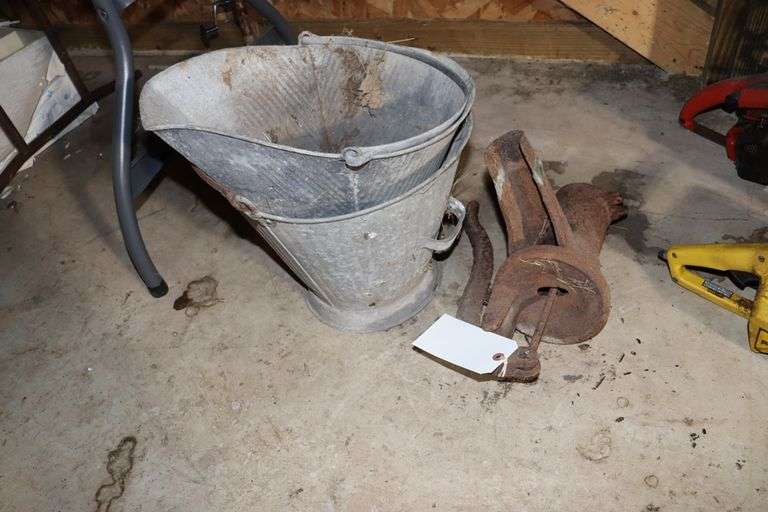 All to go - ash buckets and well pump top - Backes Commercial Auctioneers