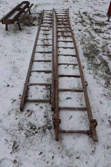 36 ft wooden extension ladder - Backes Commercial Auctioneers