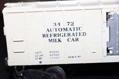 Lionel O ga. 3472 refrigerated milk box car - Backes Commercial Auctioneers