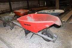 True Temper poly wheel barrel - flat tire - Backes Commercial Auctioneers