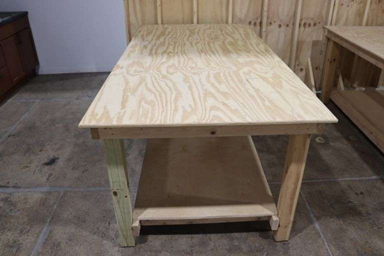 4' x 8' wood framed wood top work table - Backes Commercial Auctioneers