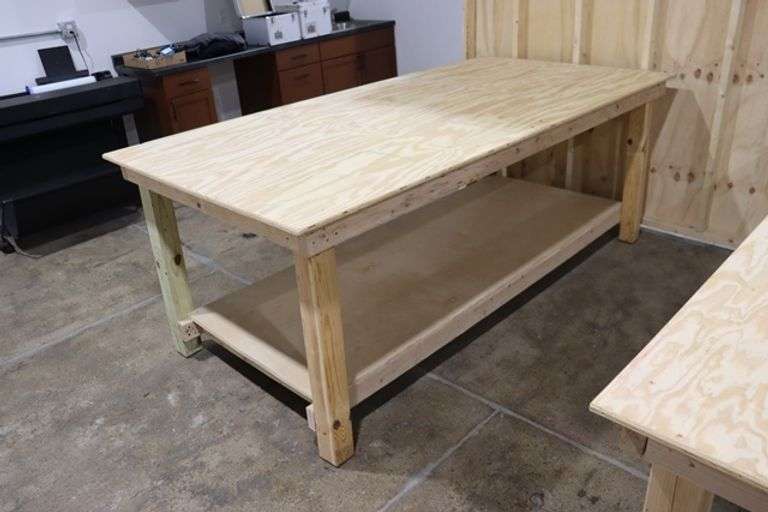 4' x 8' wood framed wood top work table - Backes Commercial Auctioneers