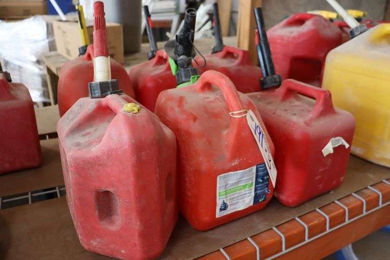 Times 3 - 2 gallon gas cans - Backes Commercial Auctioneers