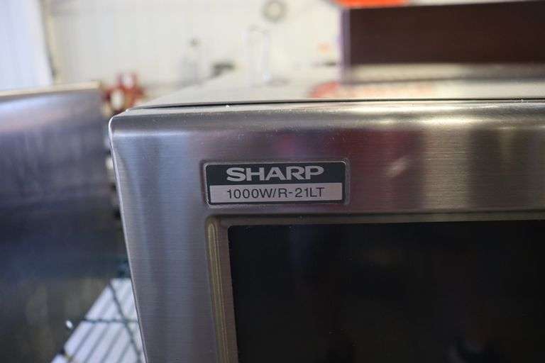 Sharp 1000W/R-21LT stainless microwave - Backes Commercial Auctioneers