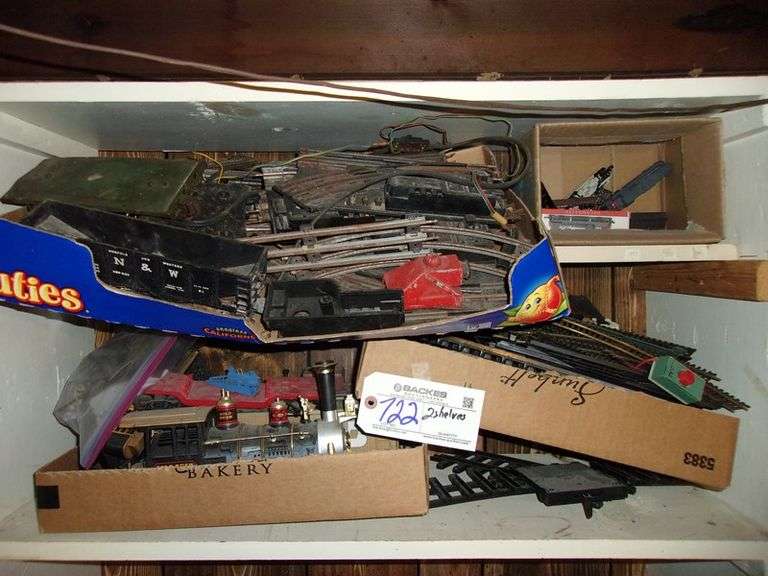 2 shelves of toy train items - Backes Commercial Auctioneers