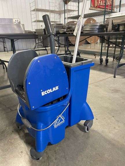 Ecolab blue mop bucket with mop - Backes Commercial Auctioneers