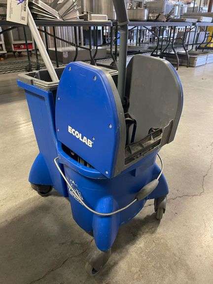 Ecolab blue mop bucket with mop - Backes Commercial Auctioneers