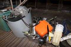 All to go - Trays, trash can, totes, & more under the table - Backes ...