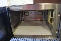 Sharp 1000W/R-21LT stainless microwave - Backes Commercial Auctioneers