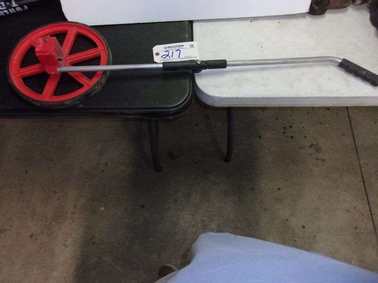 Roll out measuring tool - Backes Commercial Auctioneers