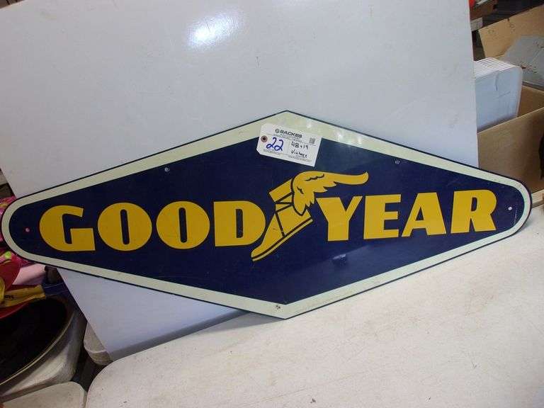 Vintage Goodyear Sign 48" x 19" - Backes Commercial Auctioneers