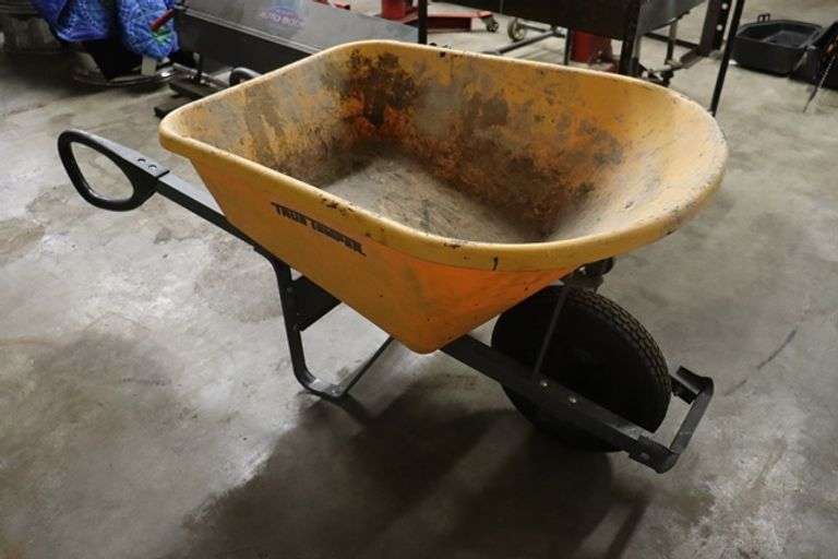 True Temper poly tub wheel barrel - Backes Commercial Auctioneers