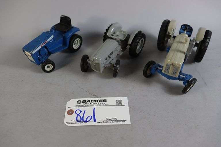 All to go - 3 Ford die cast tractors - as is Ford LGT145 garden tractor ...