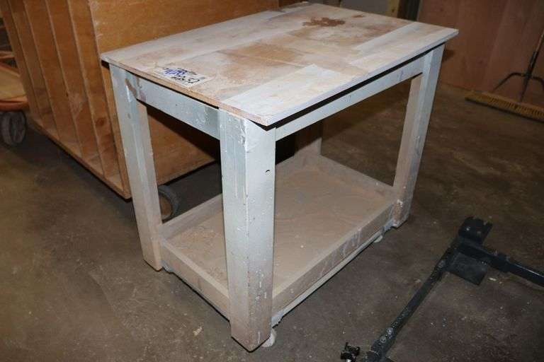 20" x 32" custom portable wood shop table - Backes Commercial Auctioneers